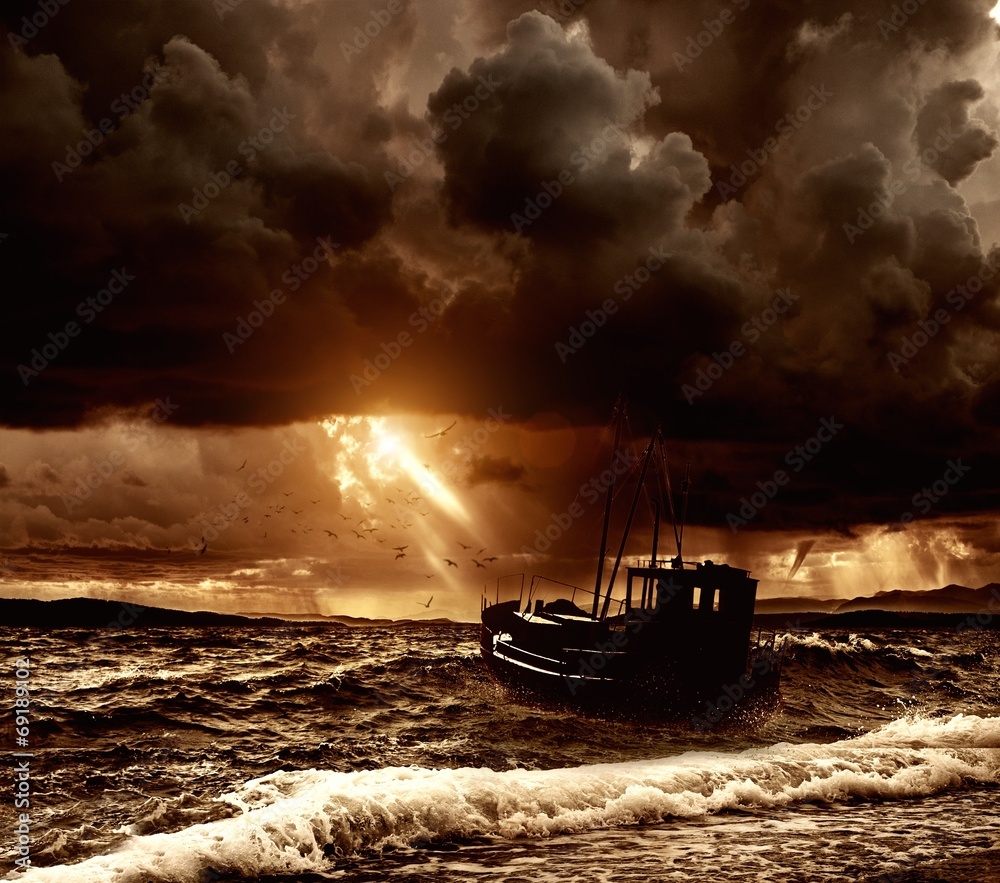 Fishing boat in a stormy sea Stock-Foto | Adobe Stock