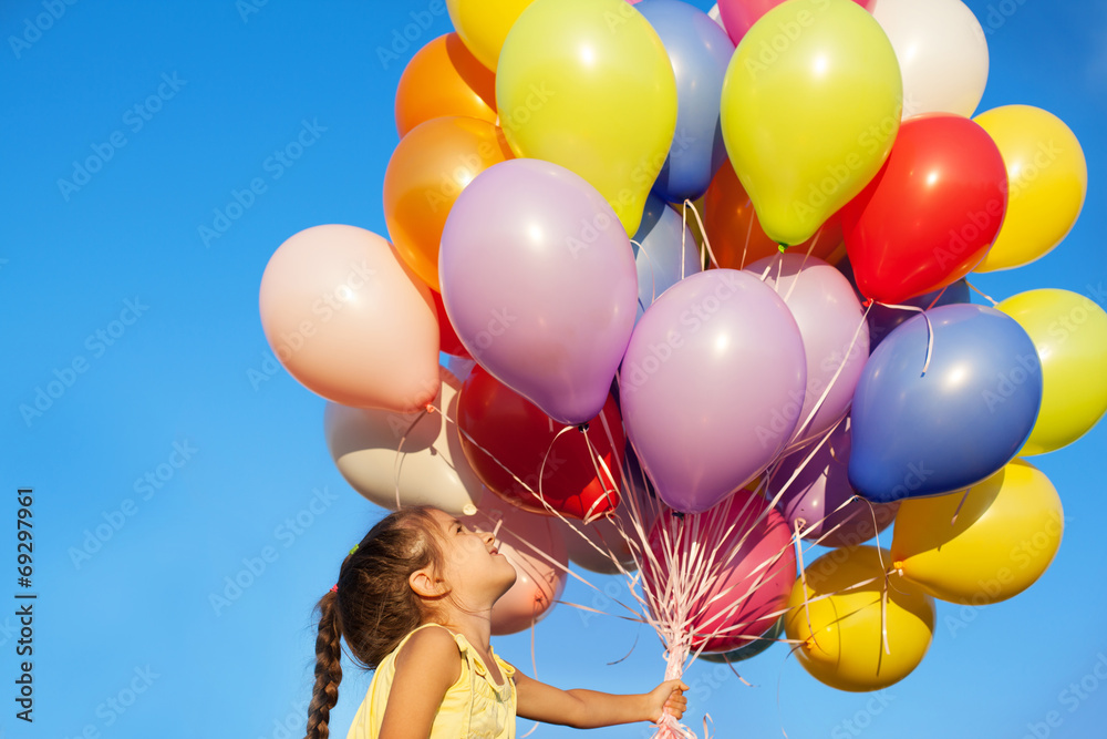 Happy little girl child kid with balloons on sky background Stock Photo ...