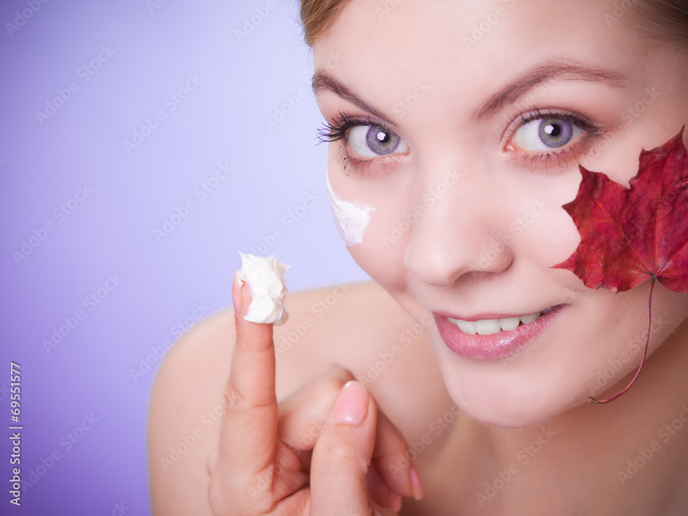 Skin care. Face of young woman girl with red maple leaf. Stock Photo ...