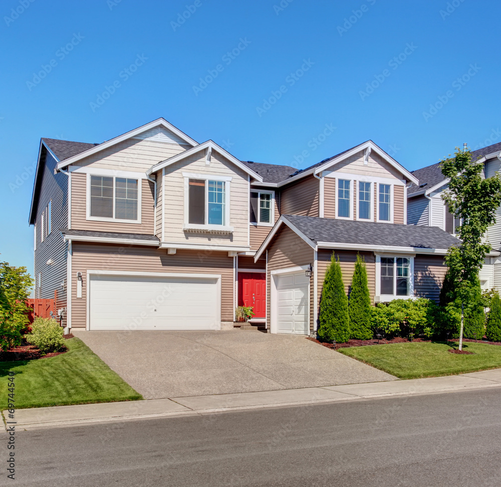 Big house exterior with garage and driveway Stock Photo | Adobe Stock