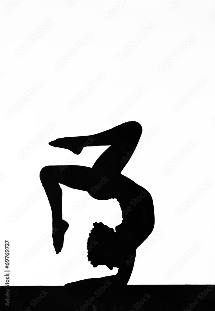women contortionist practicing gymnastic yoga in silhouette Stock Photo ...