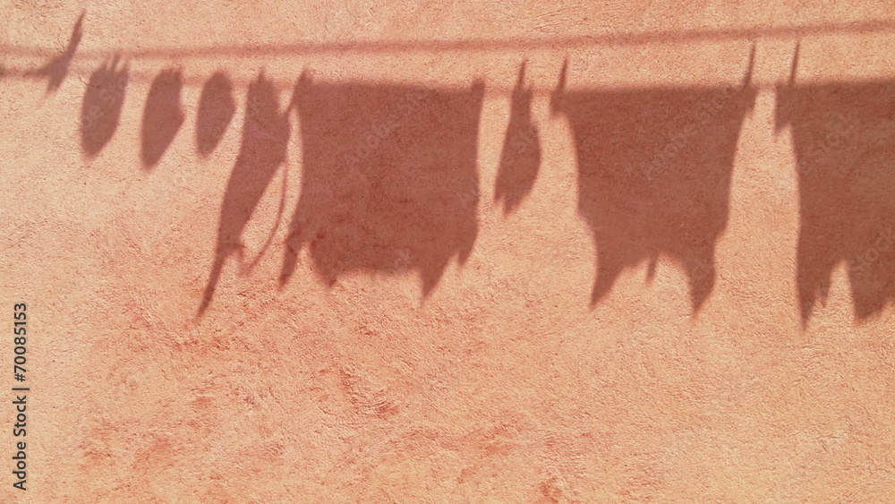 Shadow of clothes line in the wind Stock Video | Adobe Stock