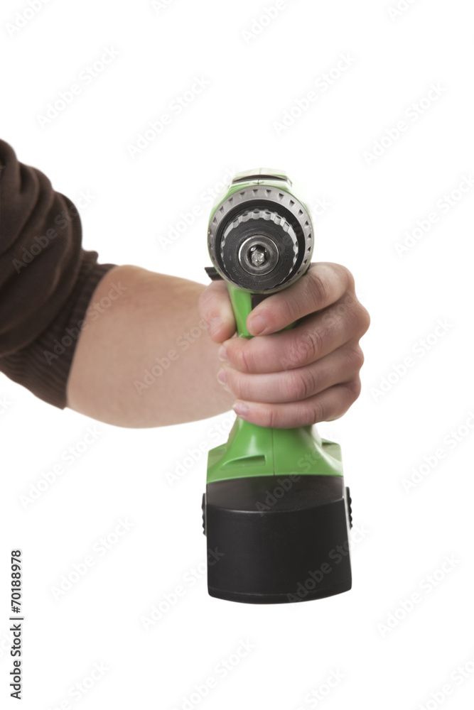 Person hand holding drill machine Stock Photo | Adobe Stock