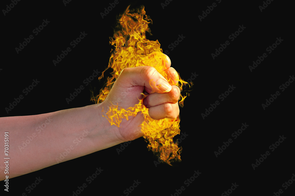 a fist of fire foto de Stock | Adobe Stock
