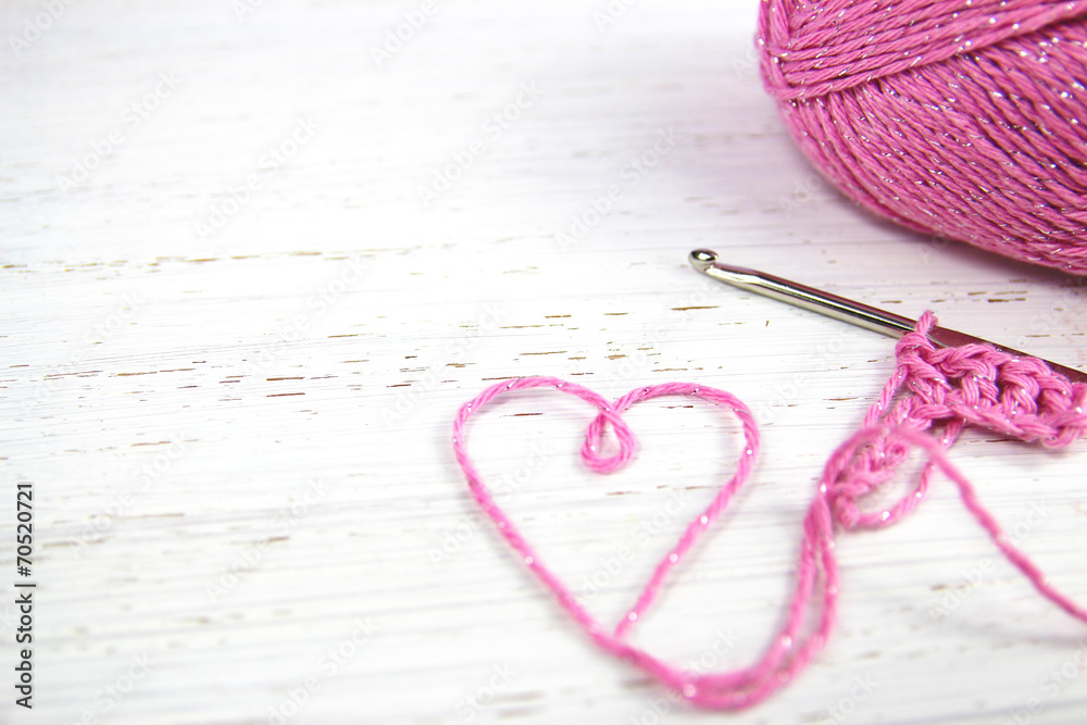 pink crochet background with yarn heart Stock Photo | Adobe Stock
