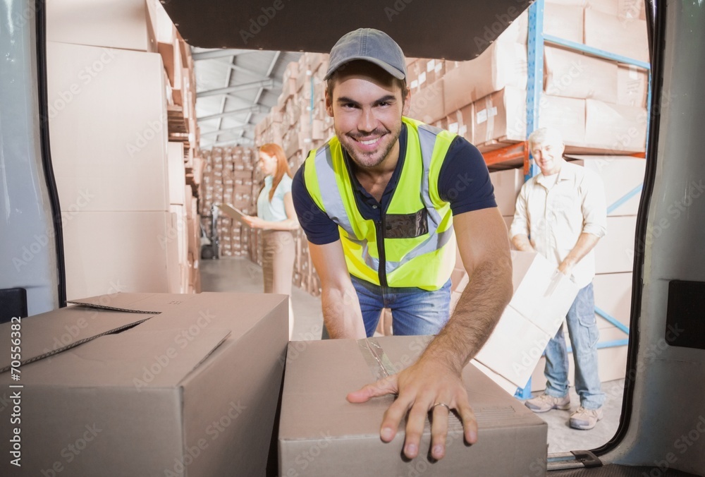 Delivery driver loading his van with boxes Stock Photo | Adobe Stock Delivery driver loading his van with boxes Stock Photo | Adobe Stock