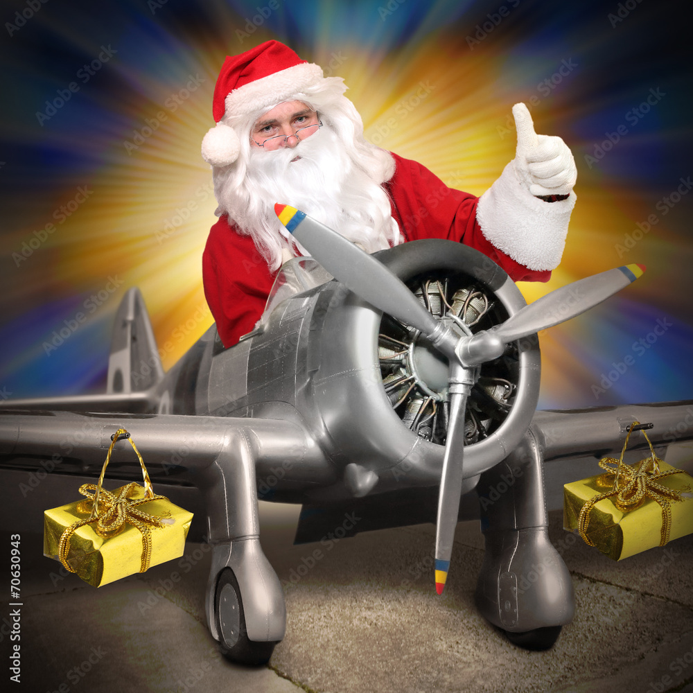Santa Claus with his cargo plane. Stock Photo | Adobe Stock