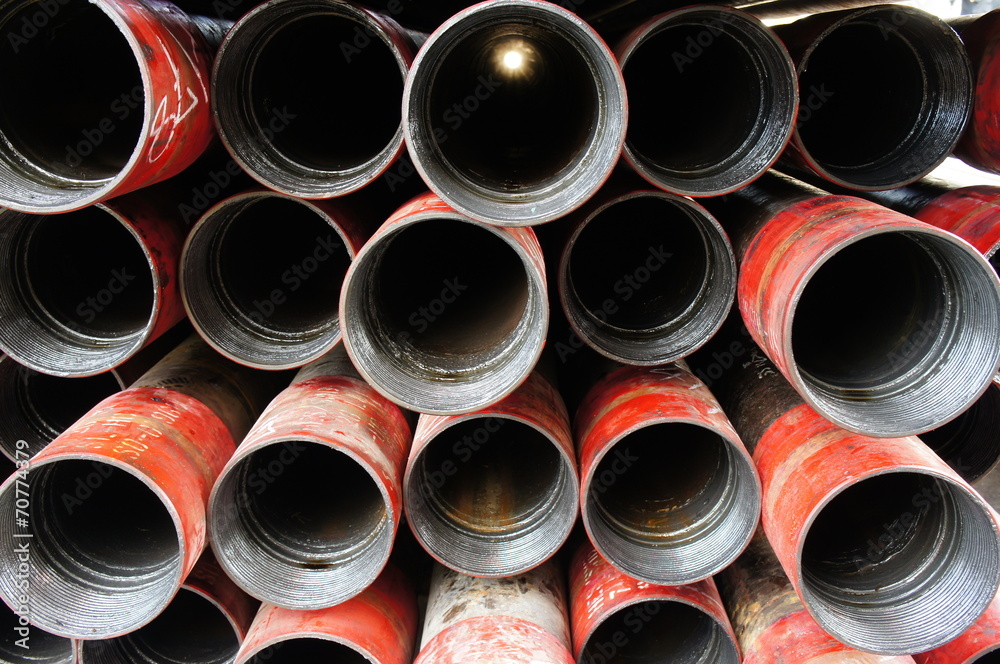 Stack of oil well intemediate casing bundles Stock Photo | Adobe Stock
