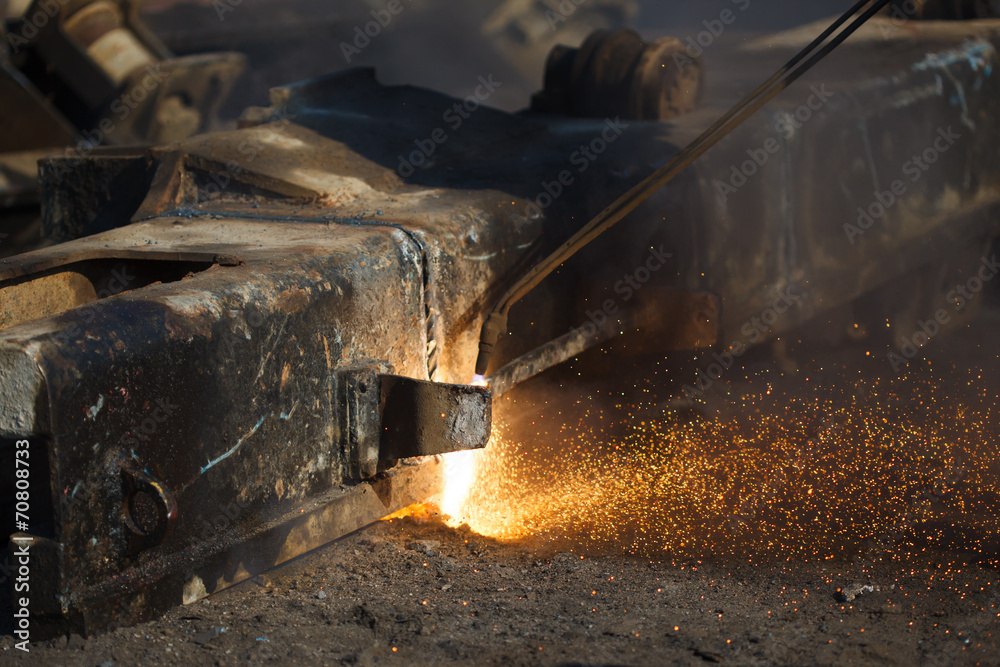 scrap metal cutting with gas welder Stock Photo | Adobe Stock