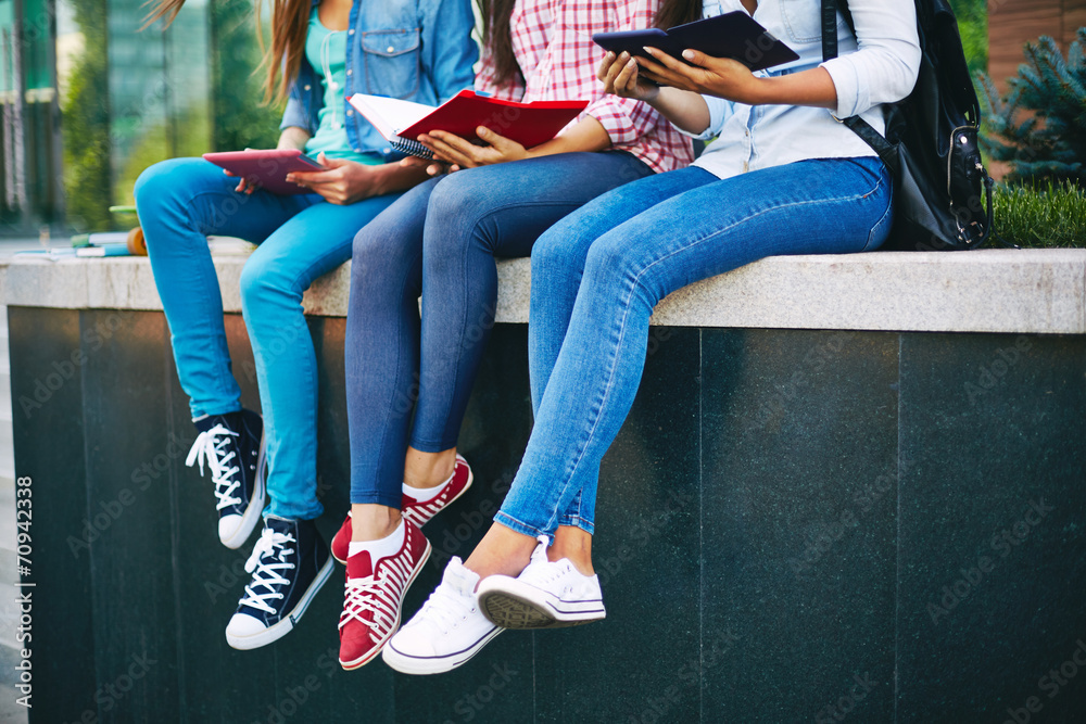 Legs of students Stock Photo | Adobe Stock