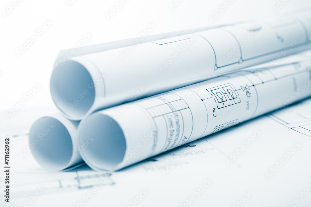 project plan background with blueprints rolls Stock Photo | Adobe Stock