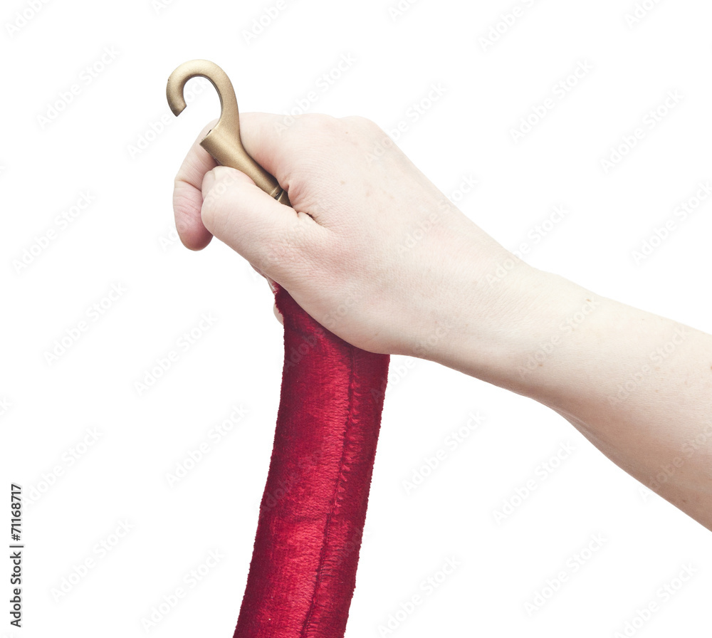 Human hand opening red velvet rope Stock Photo | Adobe Stock