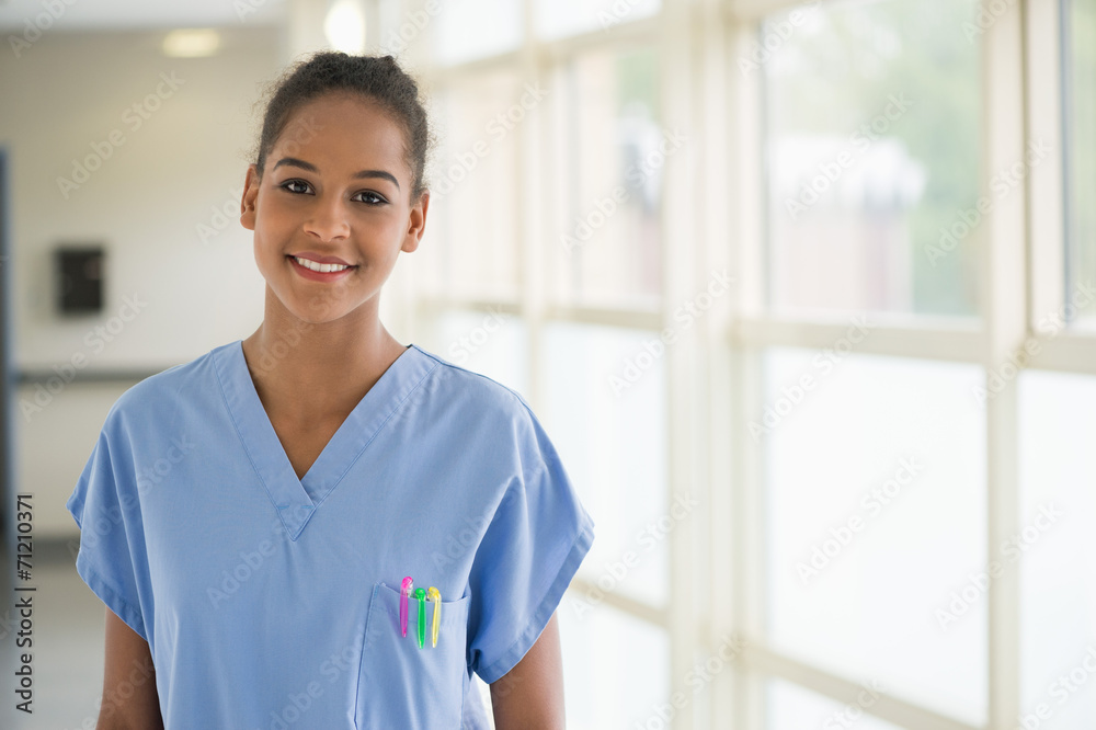 Portrait of a female nurse smiling Stock Photo | Adobe Stock