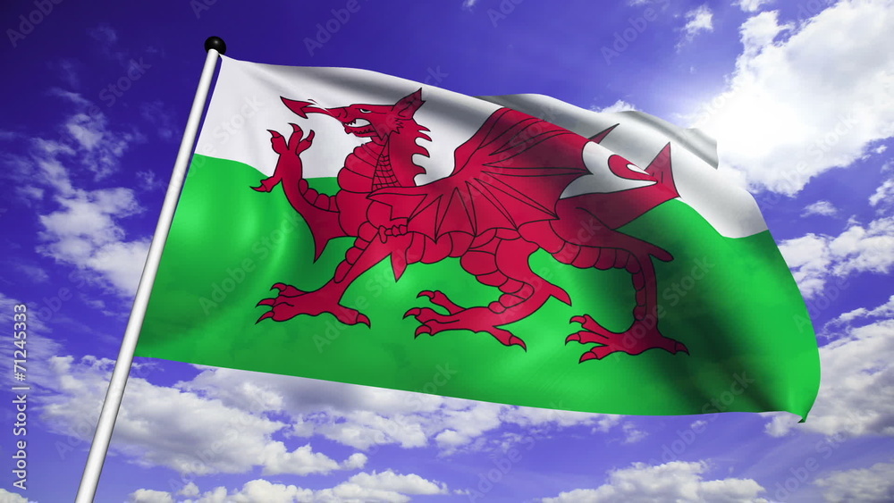 flag of Wales with fabric structure against a cloudy sky Stock Video ...