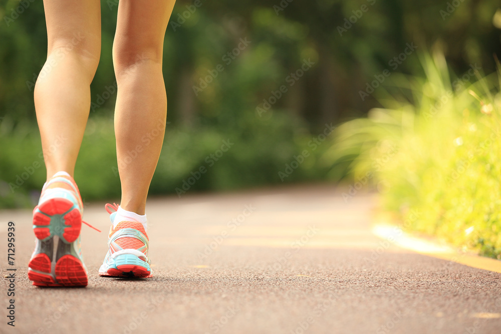 young fitness woman legs runner running on trail Stock Photo | Adobe Stock