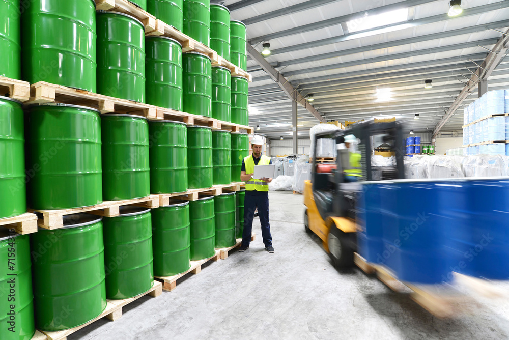 Arbeiter im Warenlager // Workers in logistics Stock-Foto | Adobe Stock