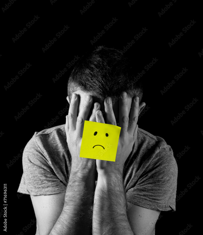 young man in depression and stress with sad face post it note Stock ...