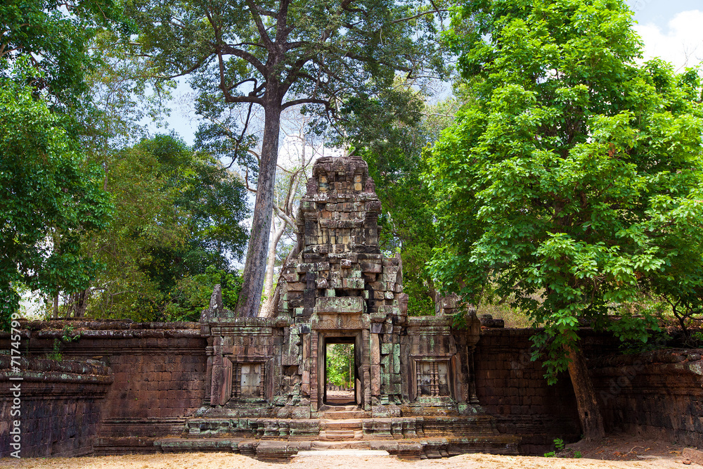 The ancient ruins of a historic Khmer temple in the temple compl Stock ...