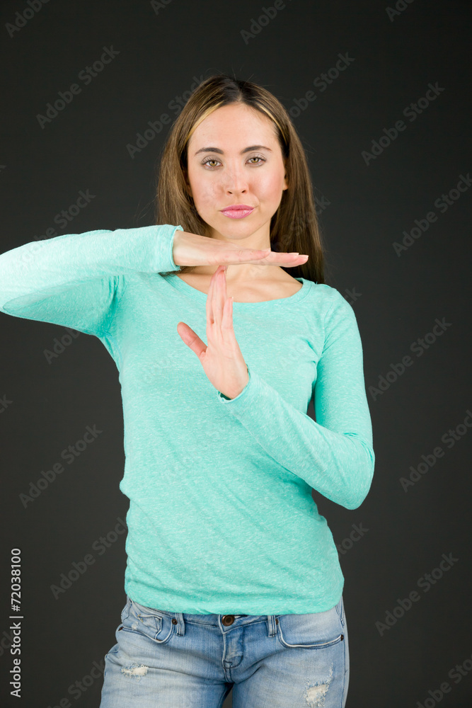 model isolated on plain background hand gesture break sign Stock Photo ...