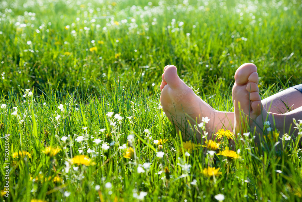 bare feet on spring grass Stock Photo | Adobe Stock