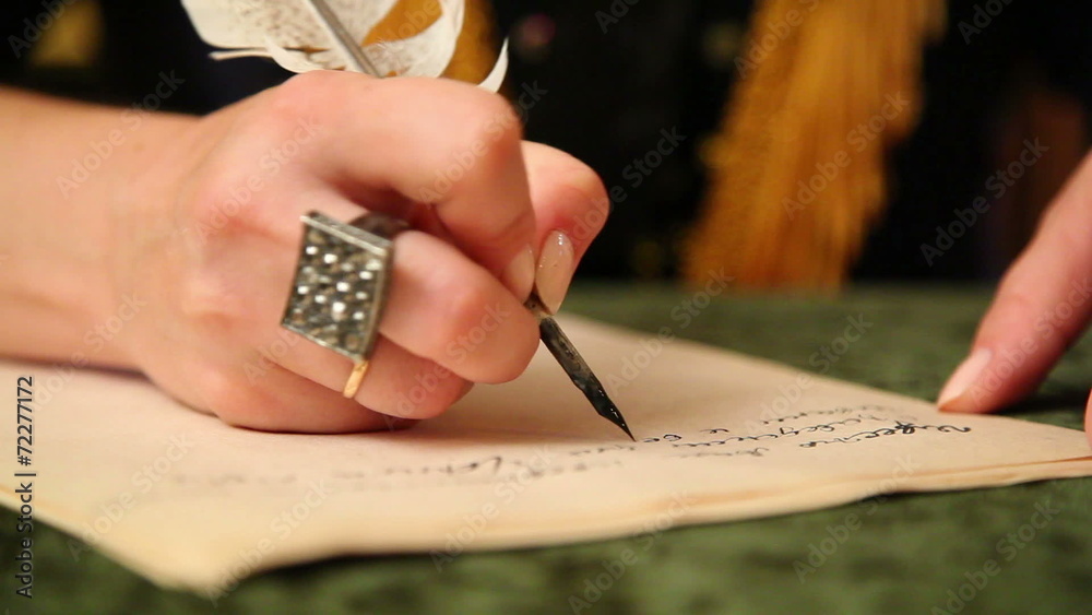 woman writes a letter to feather 4 Stock-Video | Adobe Stock