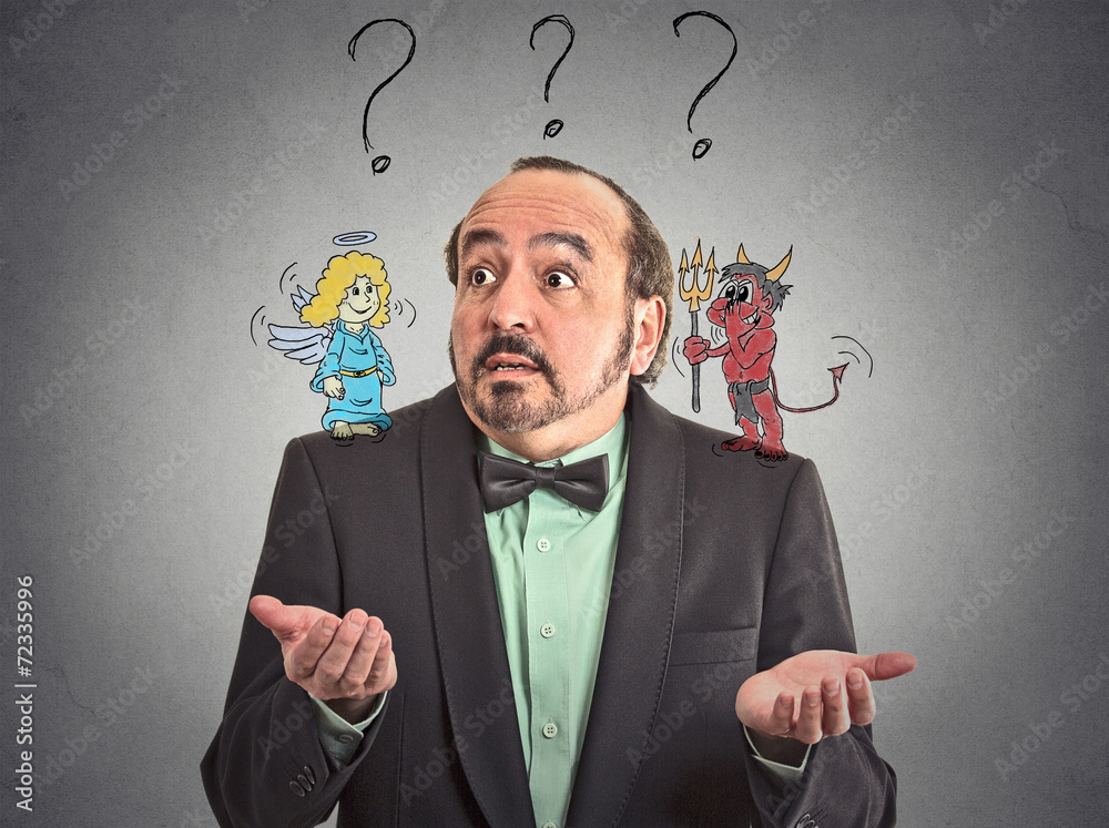 Confused guy with angel and devil on his shoulders Stock Photo | Adobe ...
