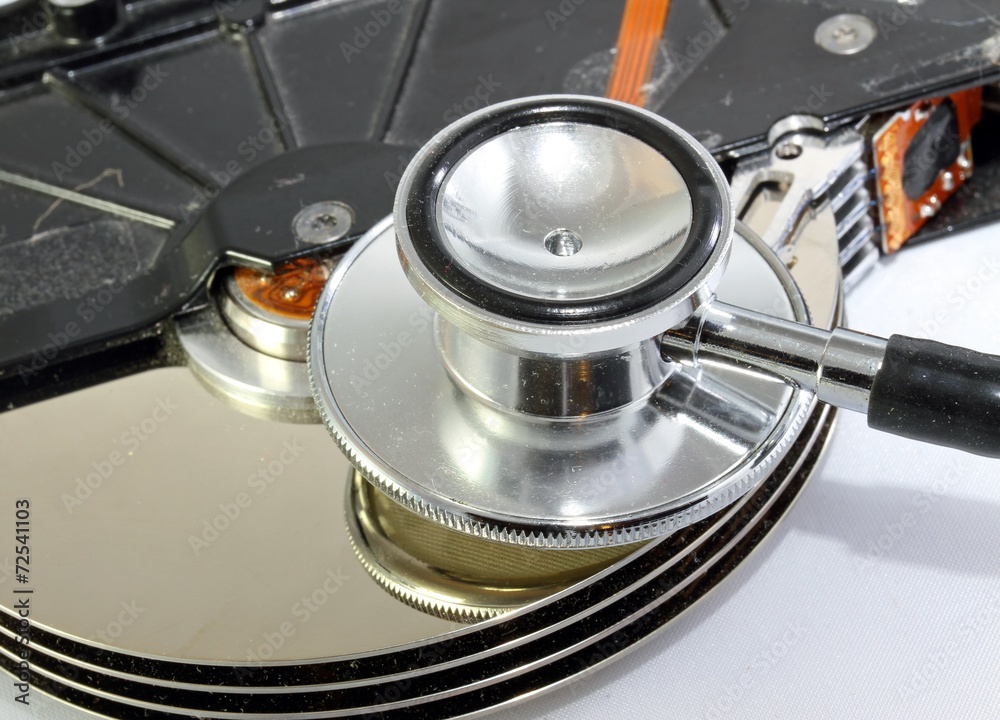 hard disk infected with computer virus with syringe and stethosc Stock ...