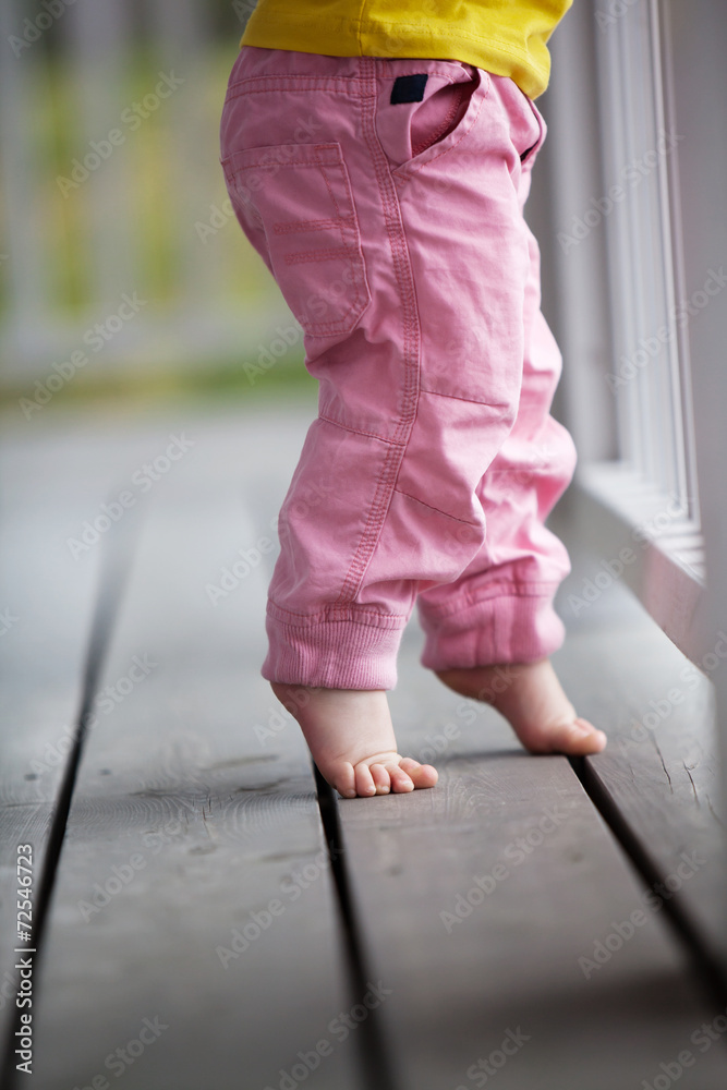 Little girl reaching up Stock-Foto | Adobe Stock