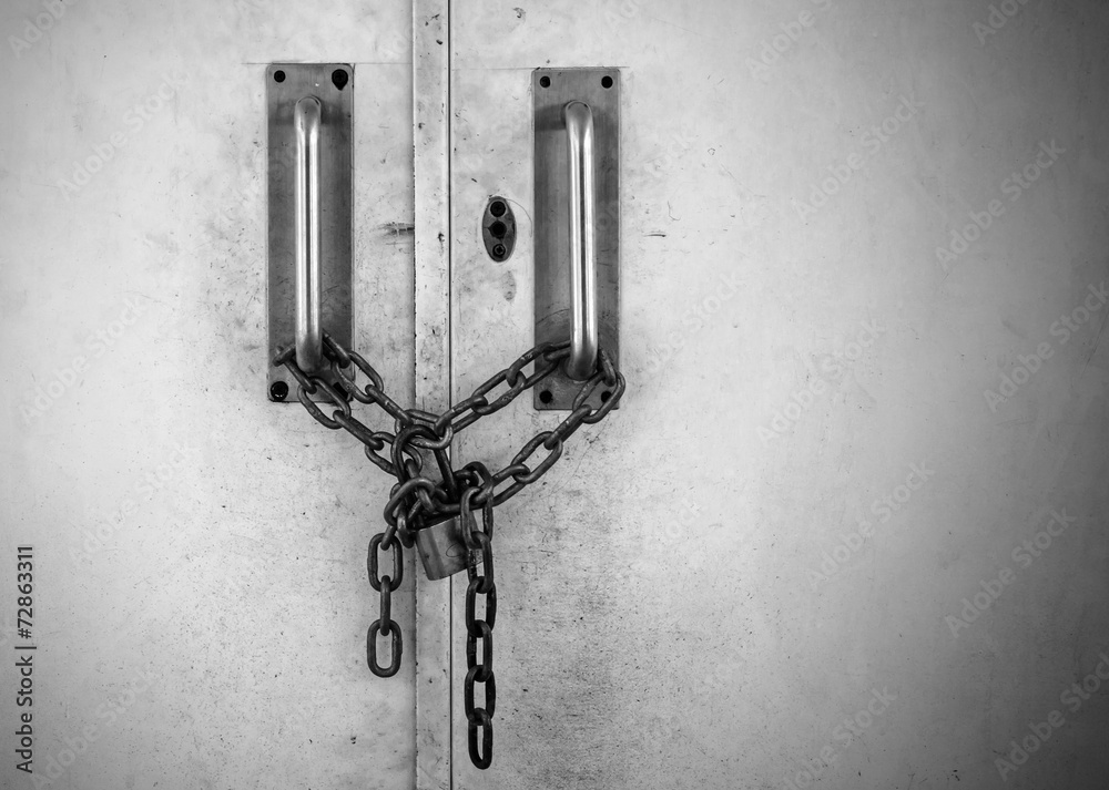 Iron lock and chain on an old door Stock Photo | Adobe Stock