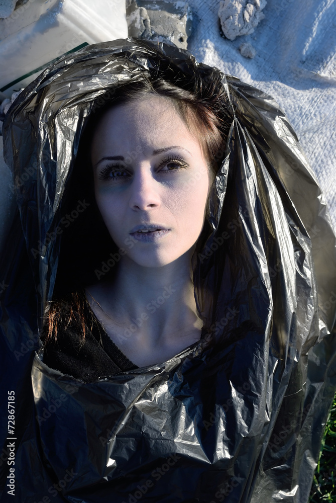 The corpse of a young girl in a garbage bag Stock Photo | Adobe Stock