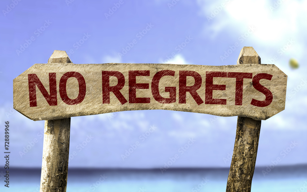 No Regrets sign with a beach on background Stock Photo | Adobe Stock