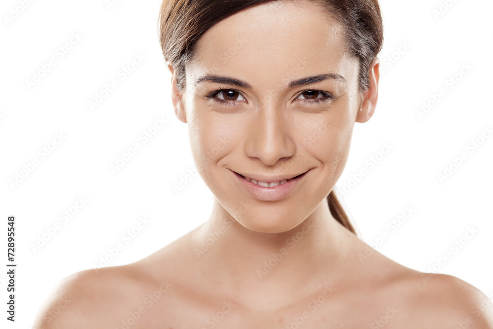 beautiful young woman with only base on her face Stock-Foto | Adobe Stock