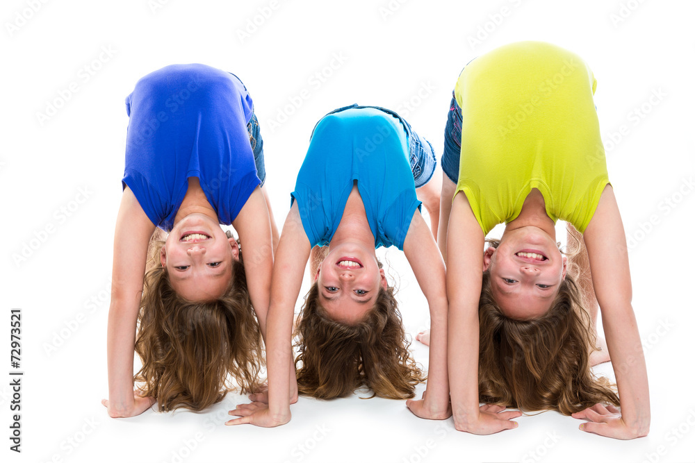 twin kid sisters playing as flexible contortionist Stock Photo | Adobe ...