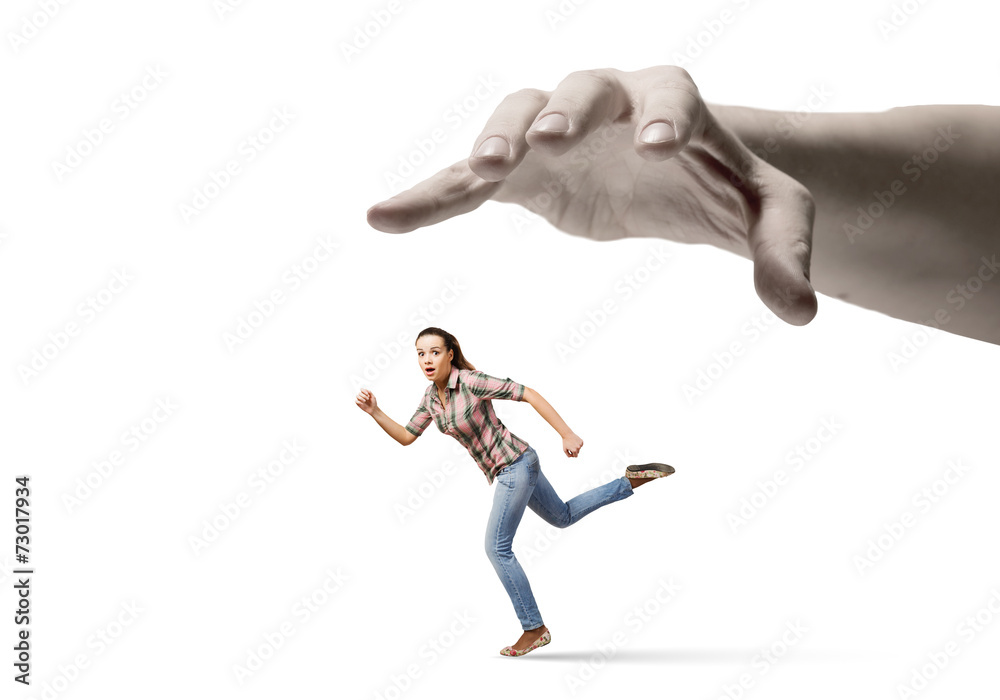 Woman escape from hand Stock Photo | Adobe Stock