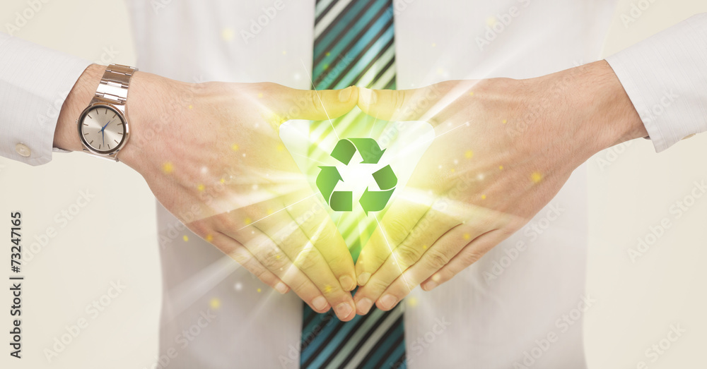 Hands creating a form with recycling sign Stock Photo | Adobe Stock