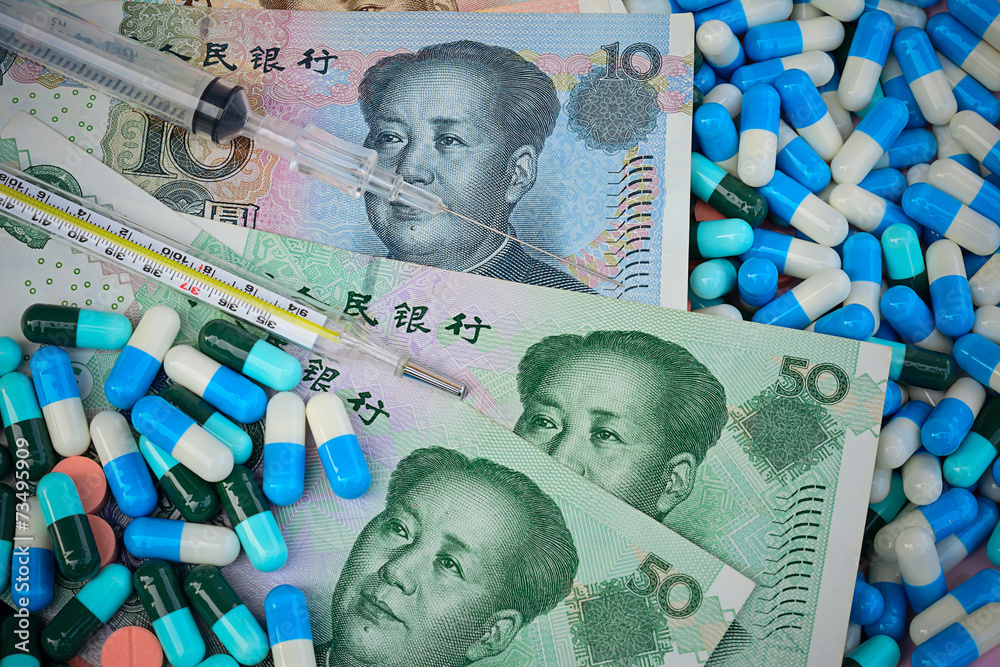 thermometer,syringe and pills on Yuan banknotes for health conc Stock ...