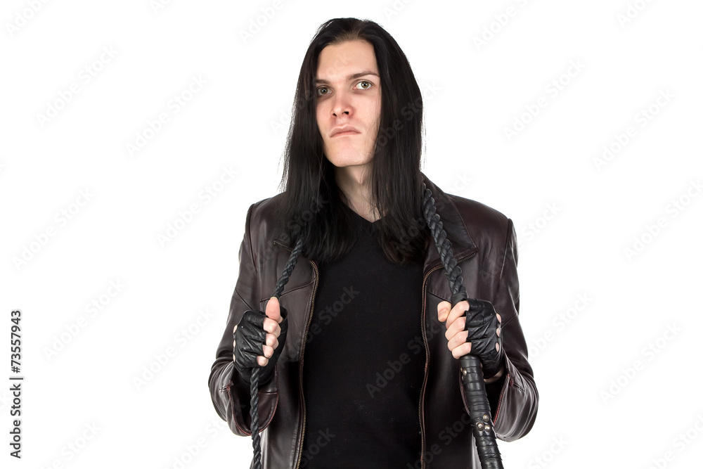 Photo of the young man with whip Stock Photo | Adobe Stock