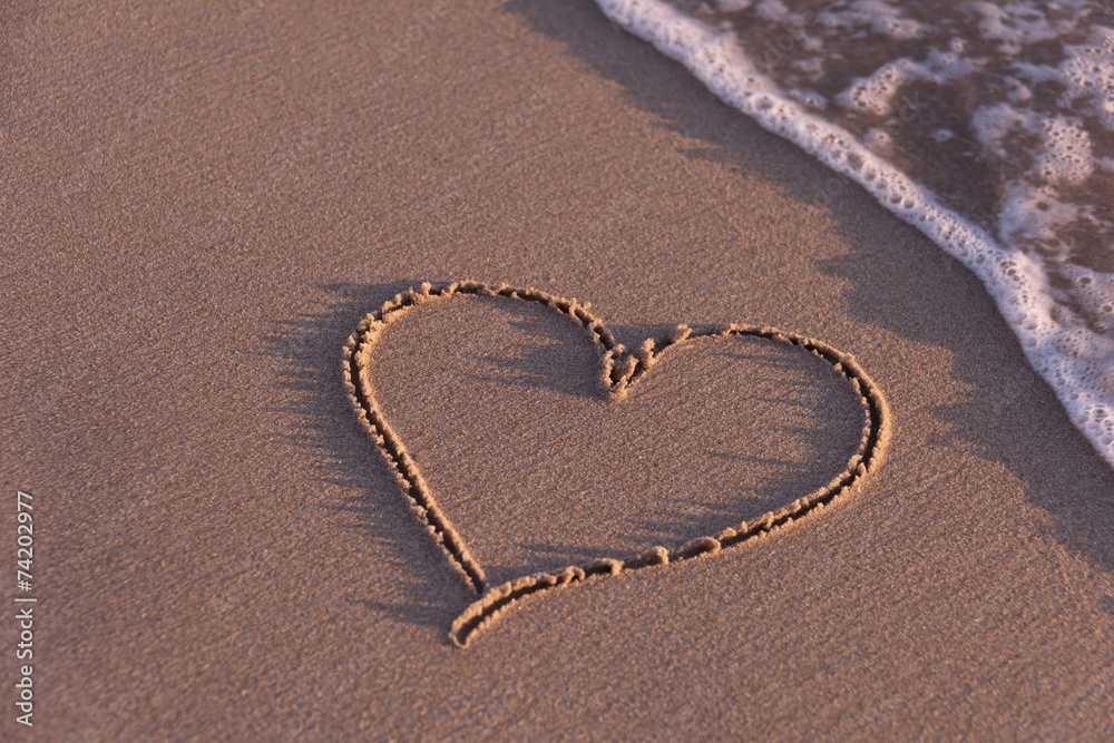 Heart shape on a beach Stock Photo | Adobe Stock