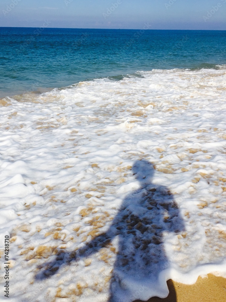 man shadow standing at the beach Stock Photo | Adobe Stock
