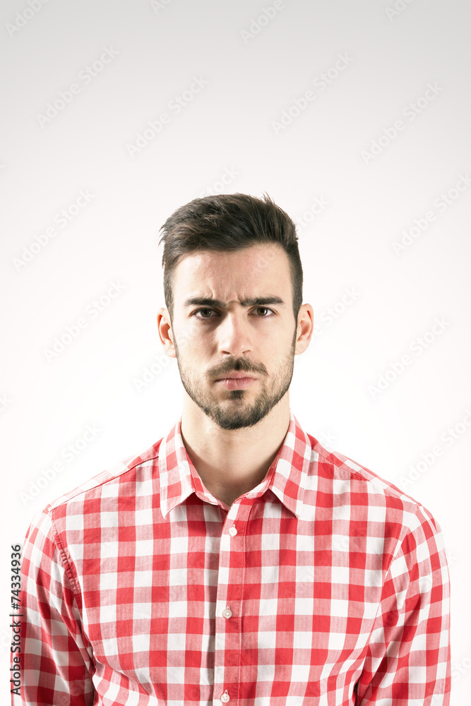 Offended man serious look at camera portrait Stock Photo | Adobe Stock