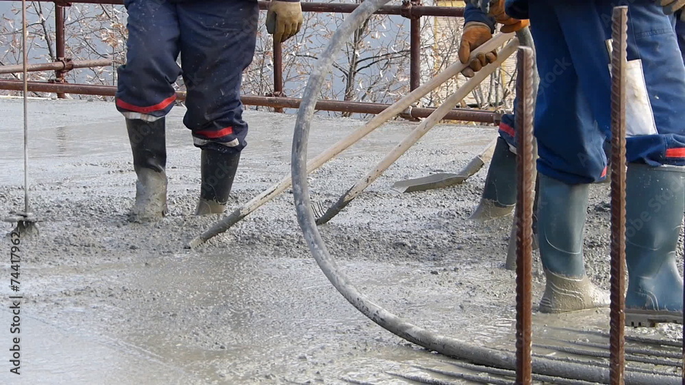 Concrete slab, construction workers working on building Stock Video ...