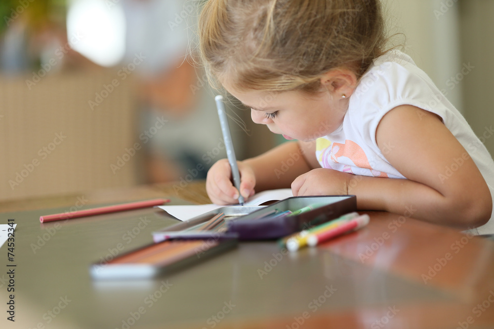 Cute little girl making drawings Stock Photo | Adobe Stock