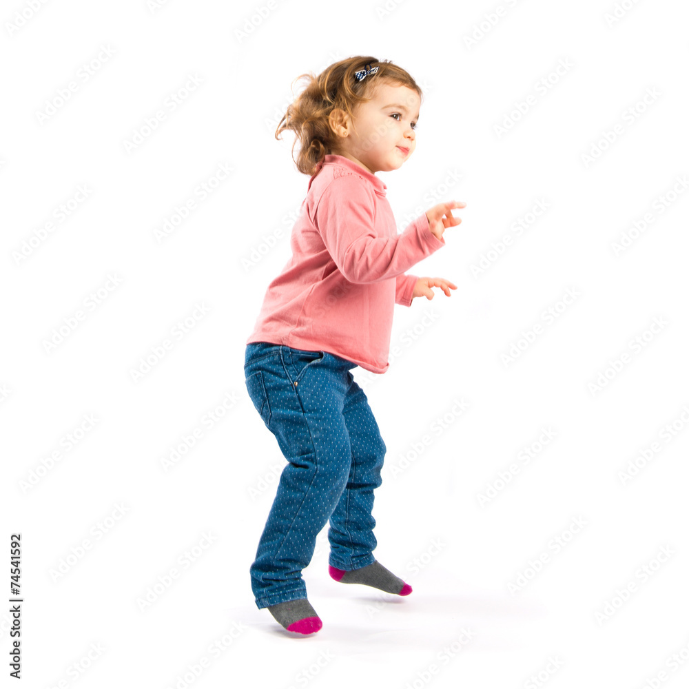 Cute baby girl jumping over white background Stock Photo | Adobe Stock