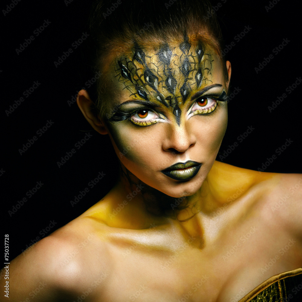 Girl with unusual makeup crocodile Stock Photo | Adobe Stock