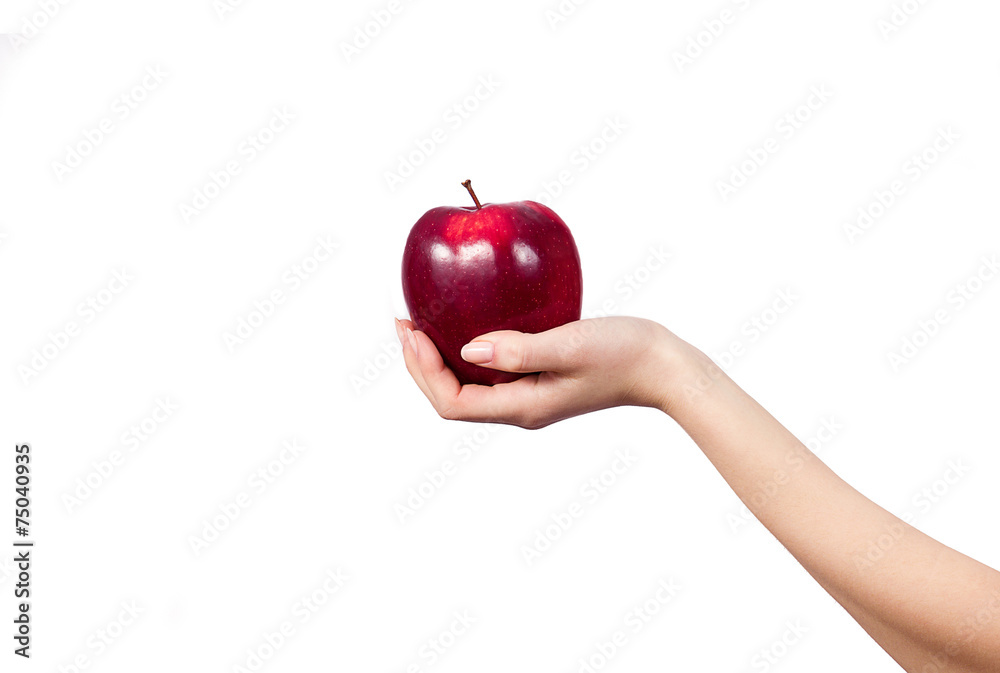 Woman's hand holding and showing a apple on white background Stock ...
