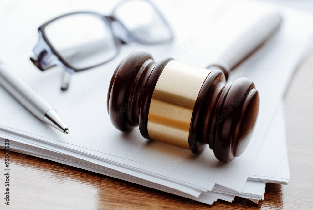 Gavel, ball pen and paper for notes on desktop Stock Photo | Adobe Stock