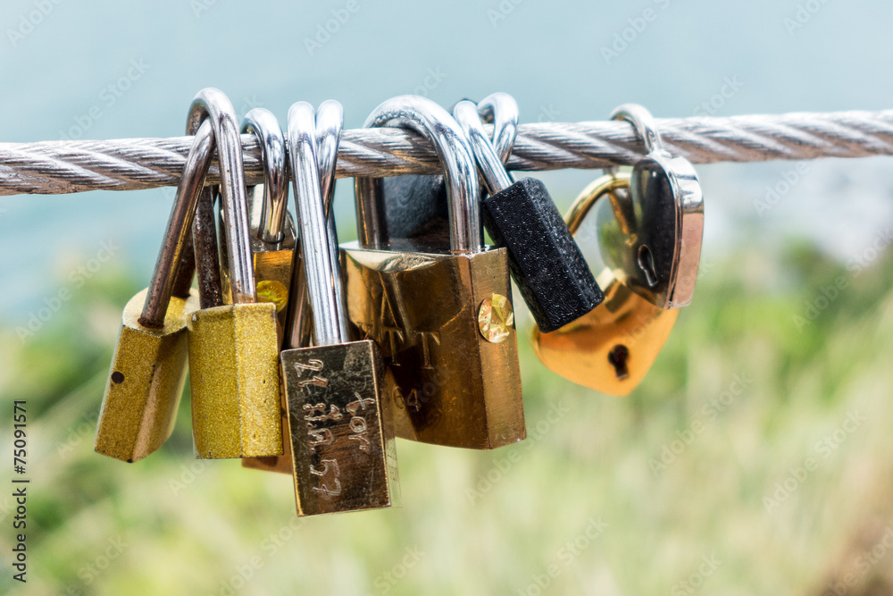 Padlock on rope Stock-Foto | Adobe Stock
