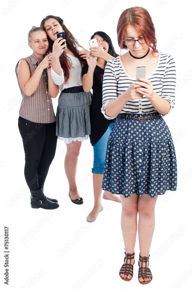 Bullying girls using smartphones Stock Photo | Adobe Stock