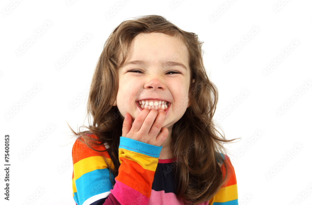 Kleines Mädchen lacht glücklich Stock-Foto | Adobe Stock