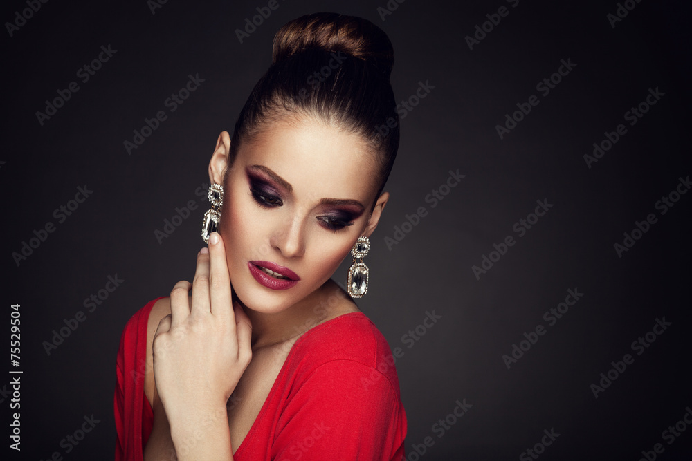 Beautiful woman posing in studio on dark background Stock Photo | Adobe ...